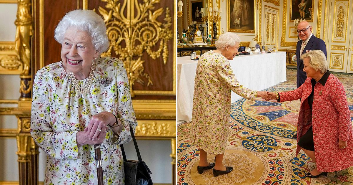 Queen Elizabeth Uses Walking Cane While Viewing Display Of Artifacts
